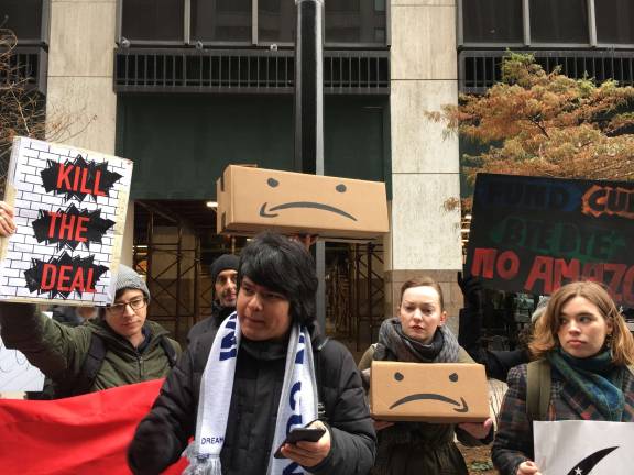 students protest cuny backing of amazon plan