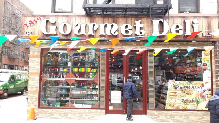 A community roars, a deli owner listens